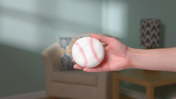 Stikball: Soft sticky plaything styled like a baseball.